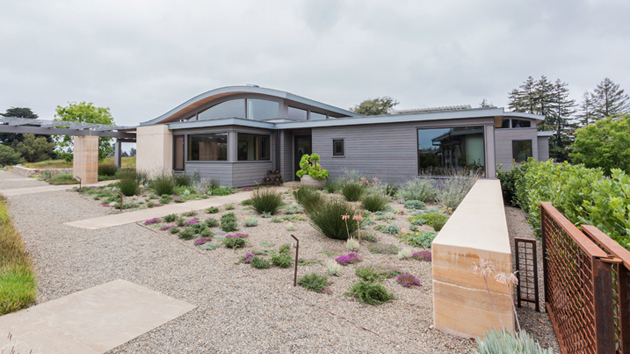 Meadow Farm House Boasts Solar Power from Its Wavy Roof | Home Design Lover